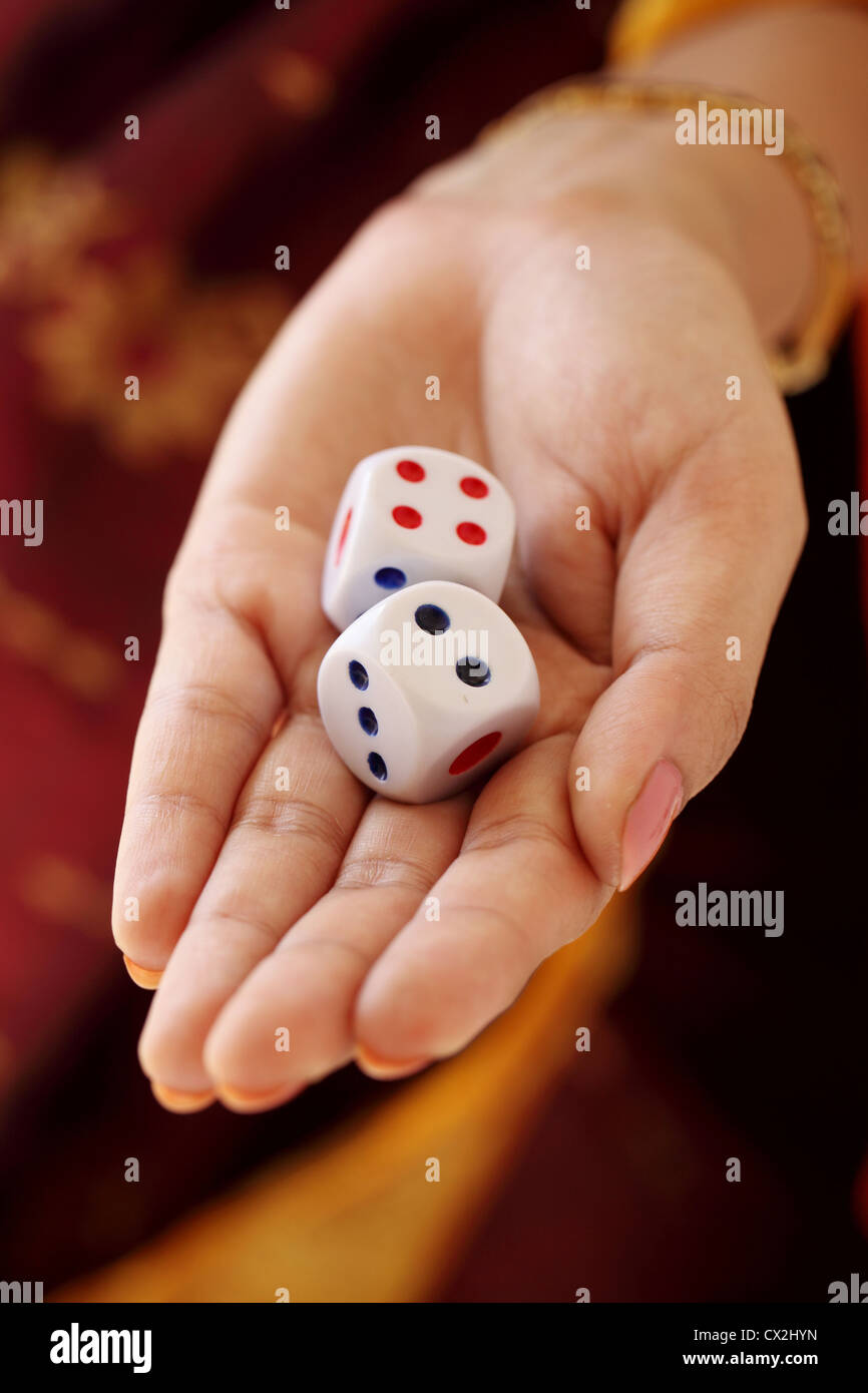 Closeup of dices in the woman hand Stock Photo - Alamy