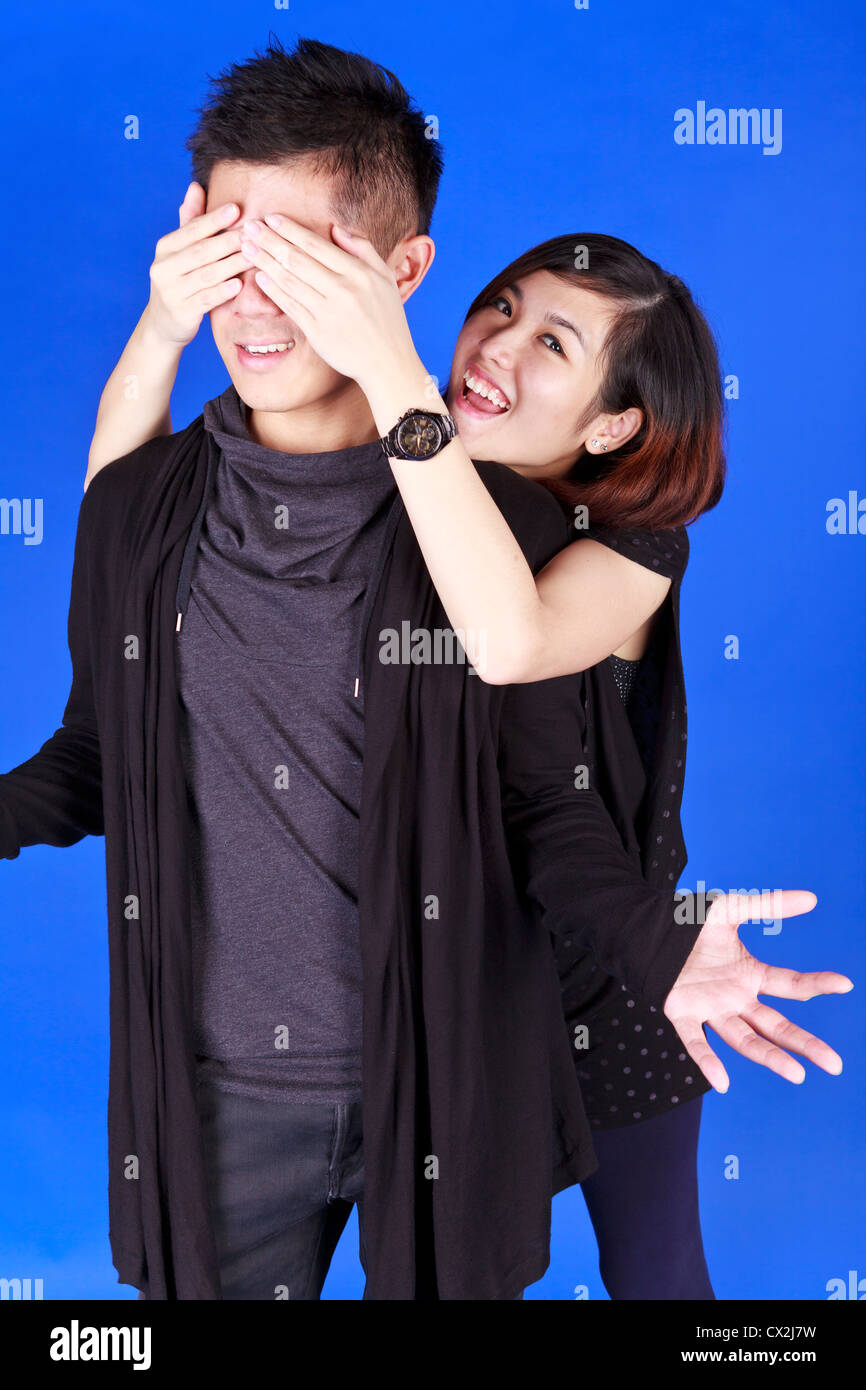Sweet couple in blue background Stock Photo - Alamy