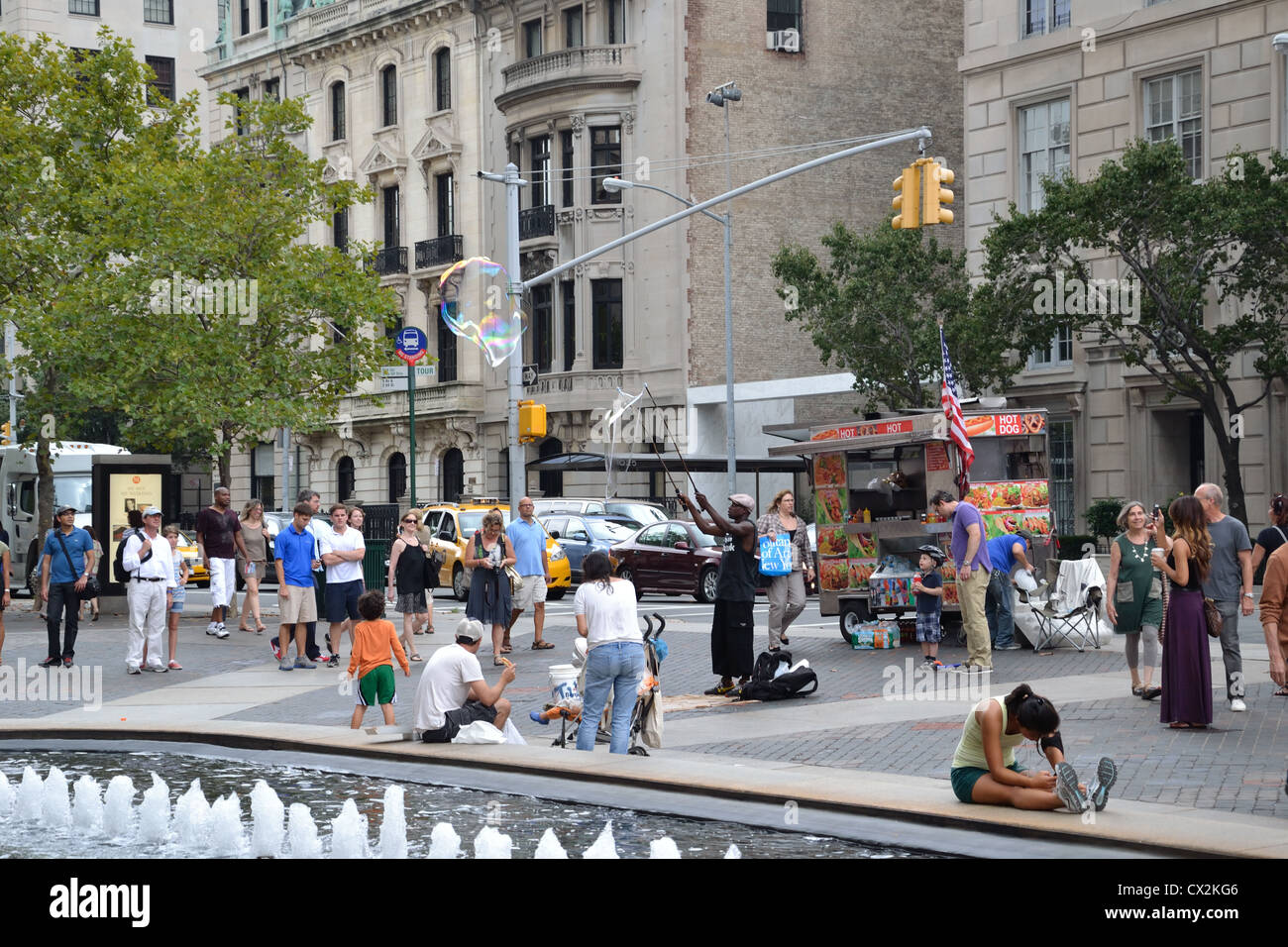 People looking at bubbles, Manhattan, New York, U.S.A Stock Photo - Alamy