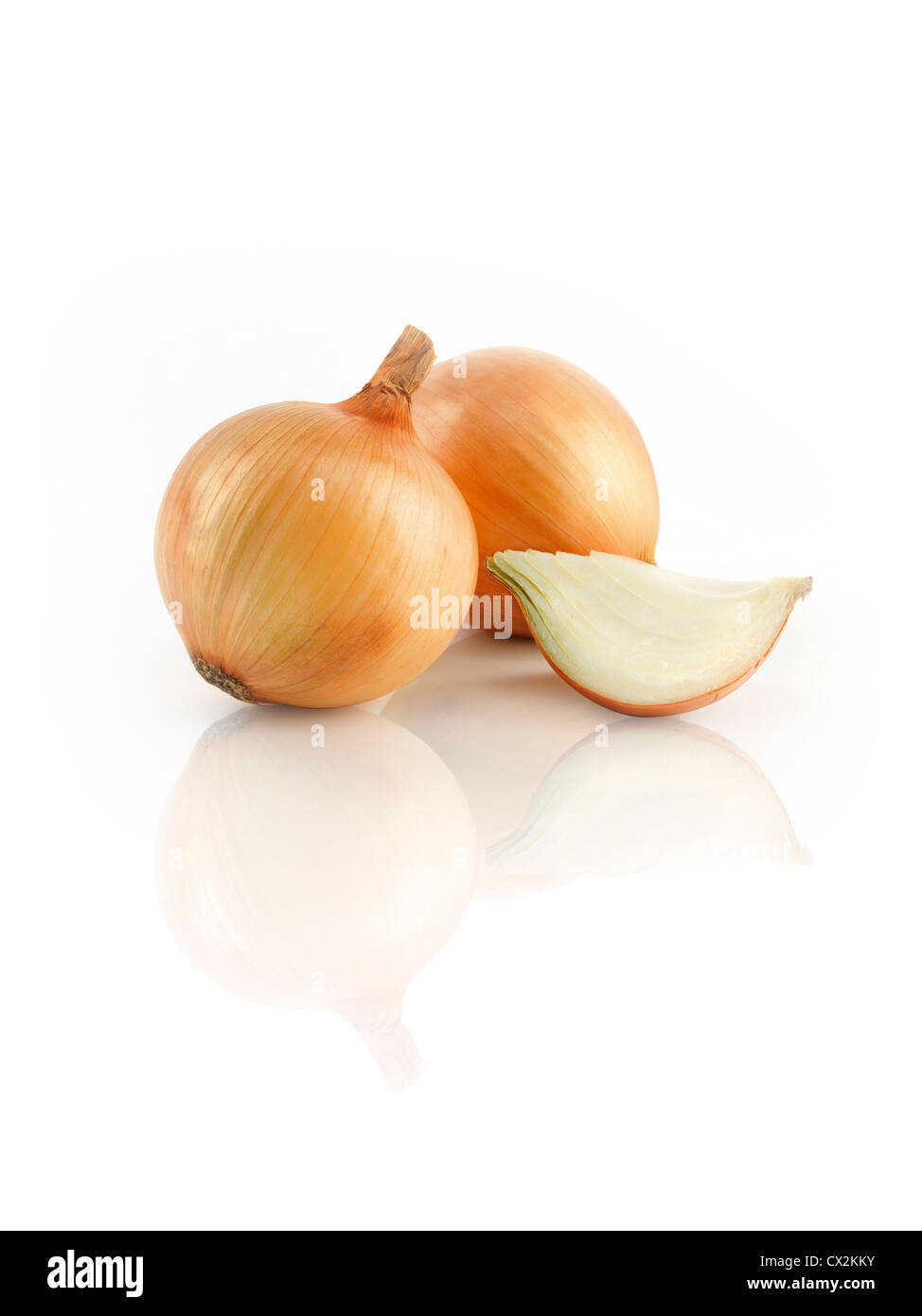 two onions and a half on reflective white table Stock Photo - Alamy