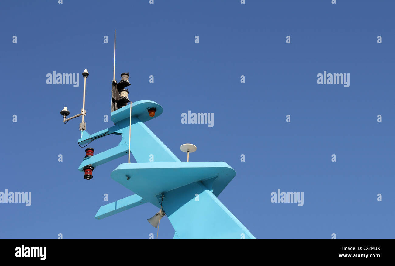Ship antenna for navigation and communication on blue tower Stock Photo ...