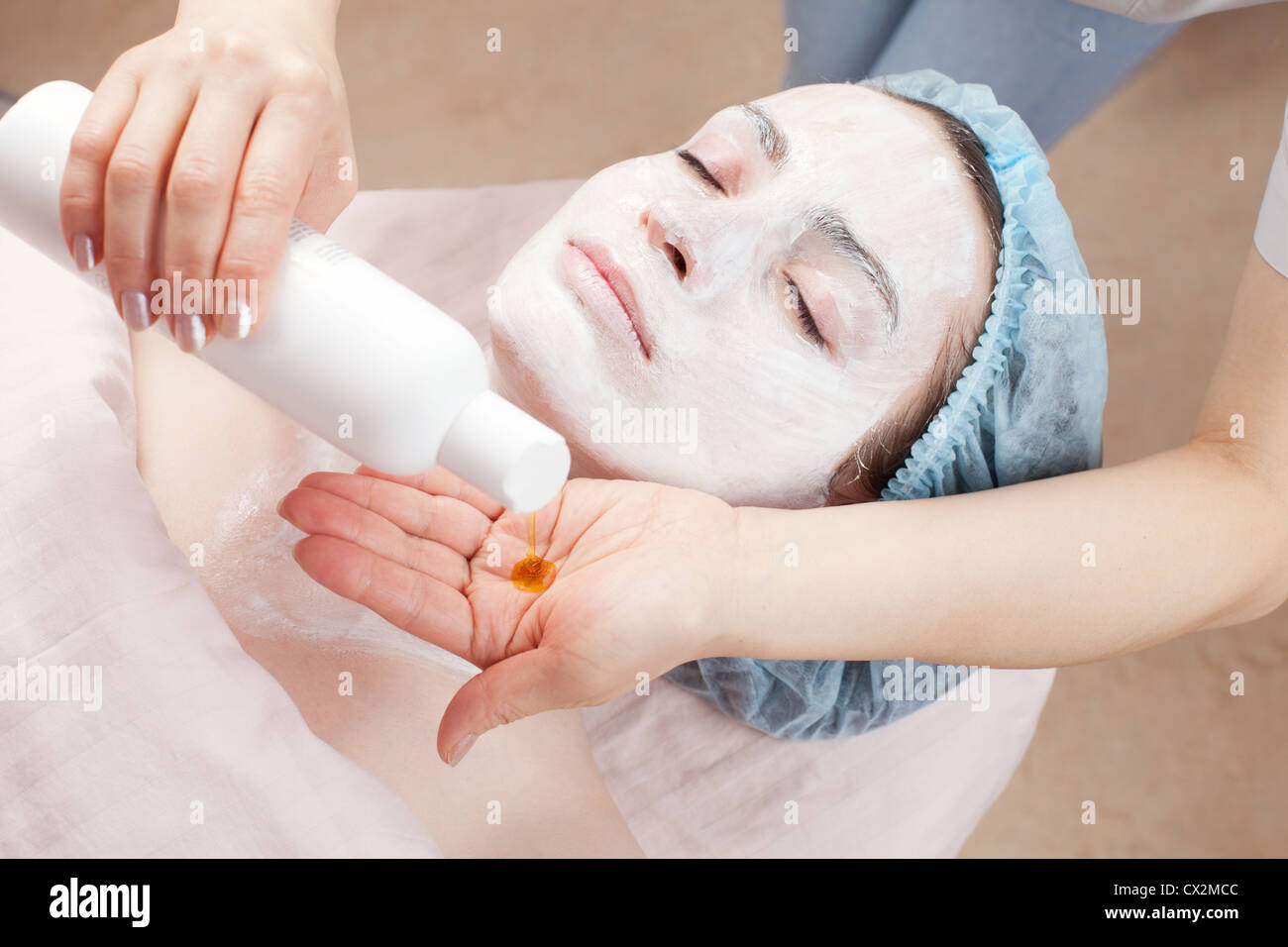 Beautiful woman with clear skin getting beauty treatment of her face at ...