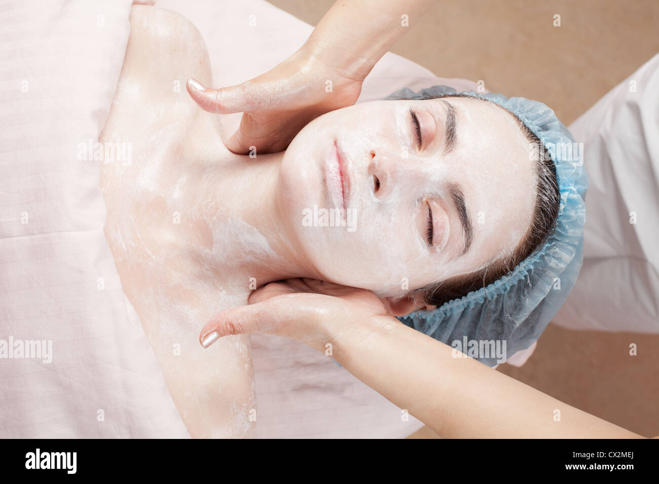 Beautiful woman with clear skin getting beauty treatment of her face at ...