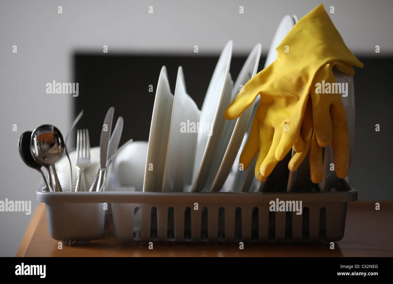 Drying Up on the draining board in a kitchen Stock Photo - Alamy