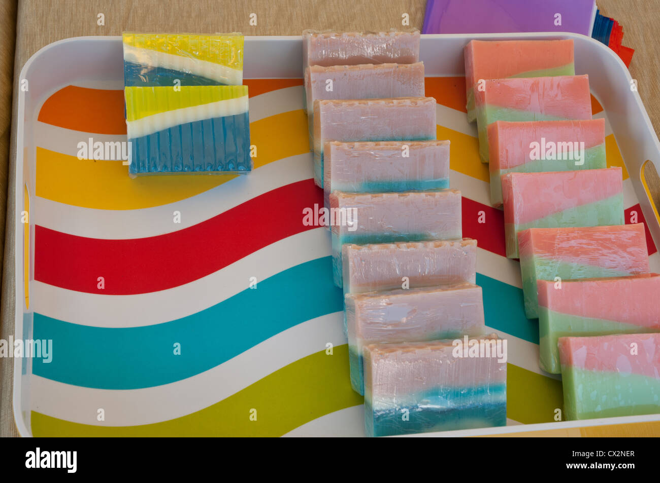 A colorful display of artisan hand soaps Stock Photo - Alamy