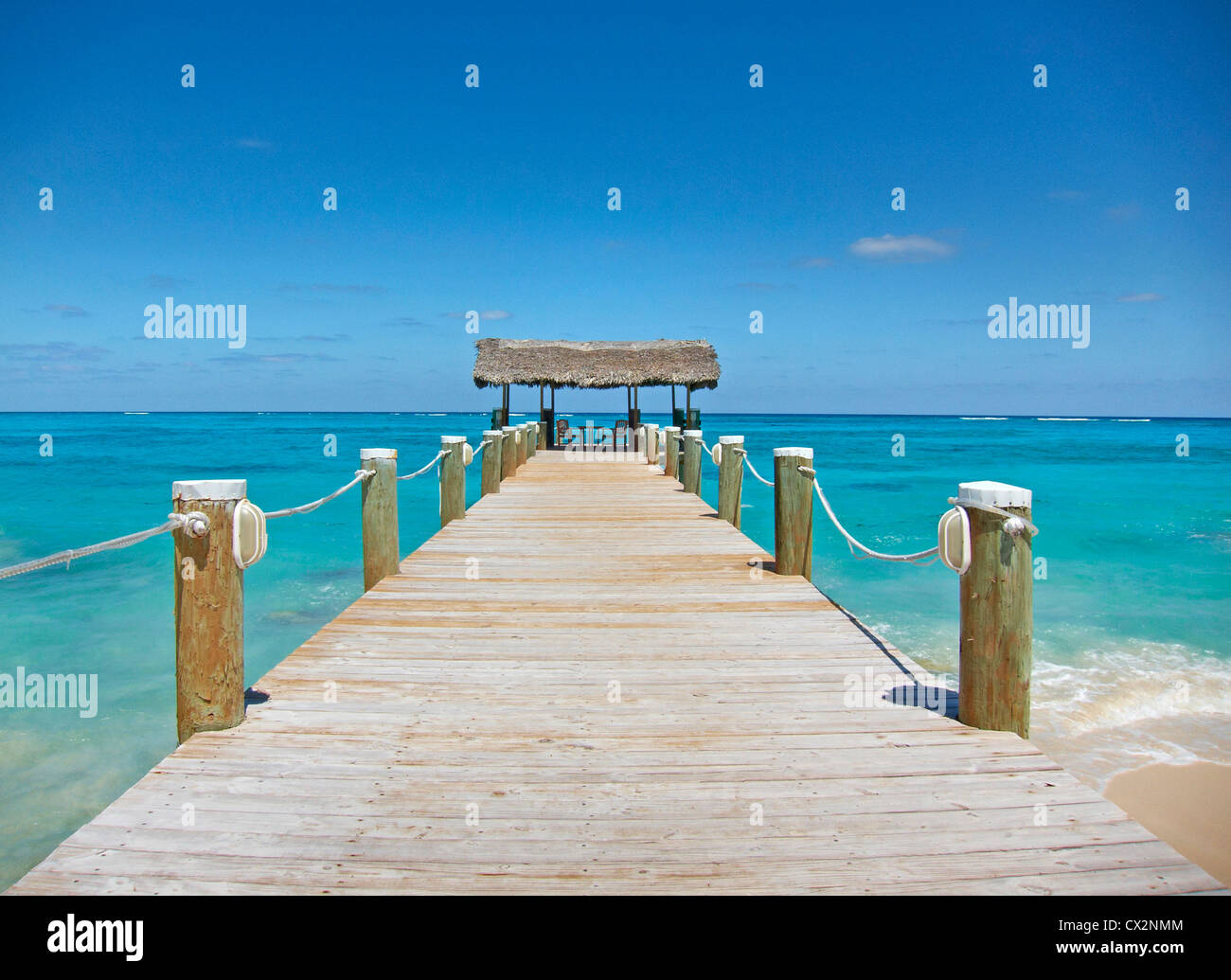 a long docking pier in the bahamas Stock Photo - Alamy