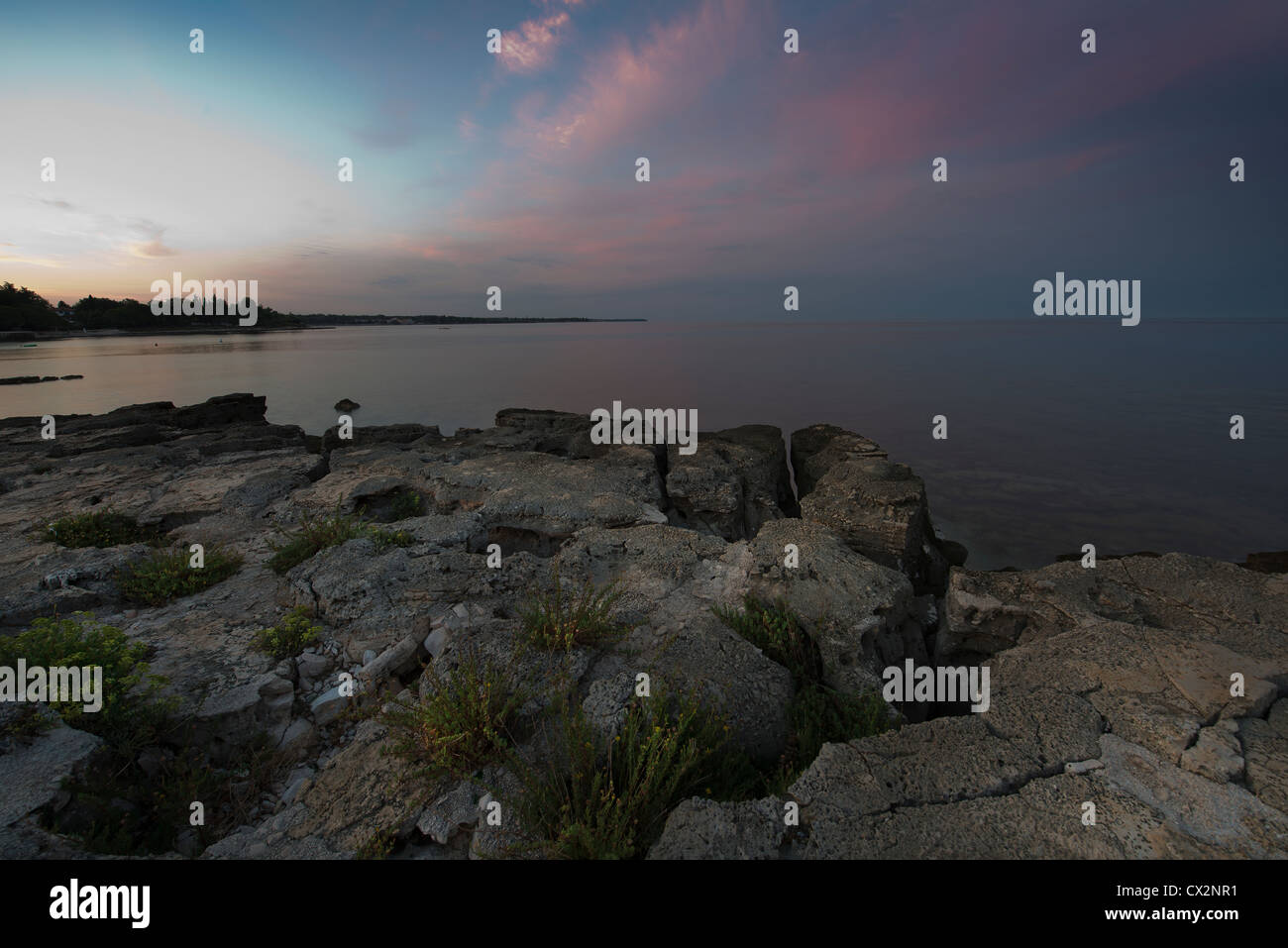 the dawn on the coast of the sea Stock Photo - Alamy