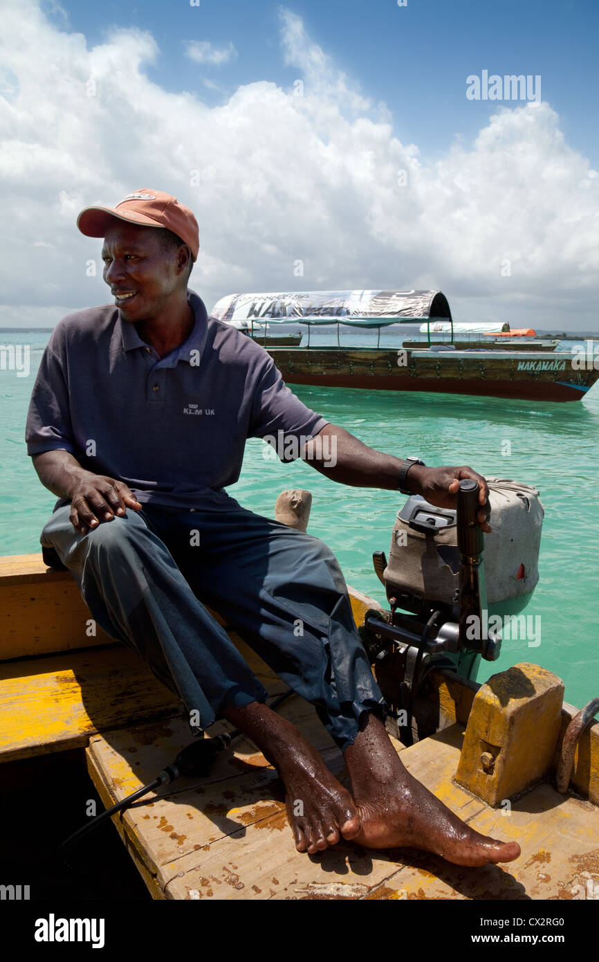 African Boat owner pilot, Zanzibar Tanzanian Africa Stock Photo - Alamy