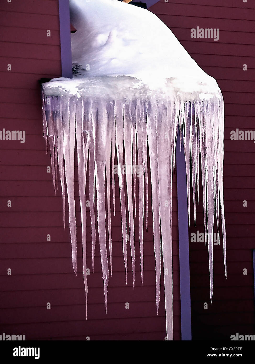 A winter scene of icicles hanging from a reef Stock Photo - Alamy