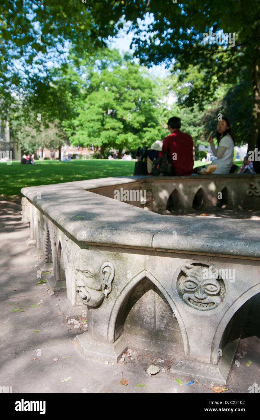 Stone park bench at Dean's Park, York Minster Stock Photo - Alamy