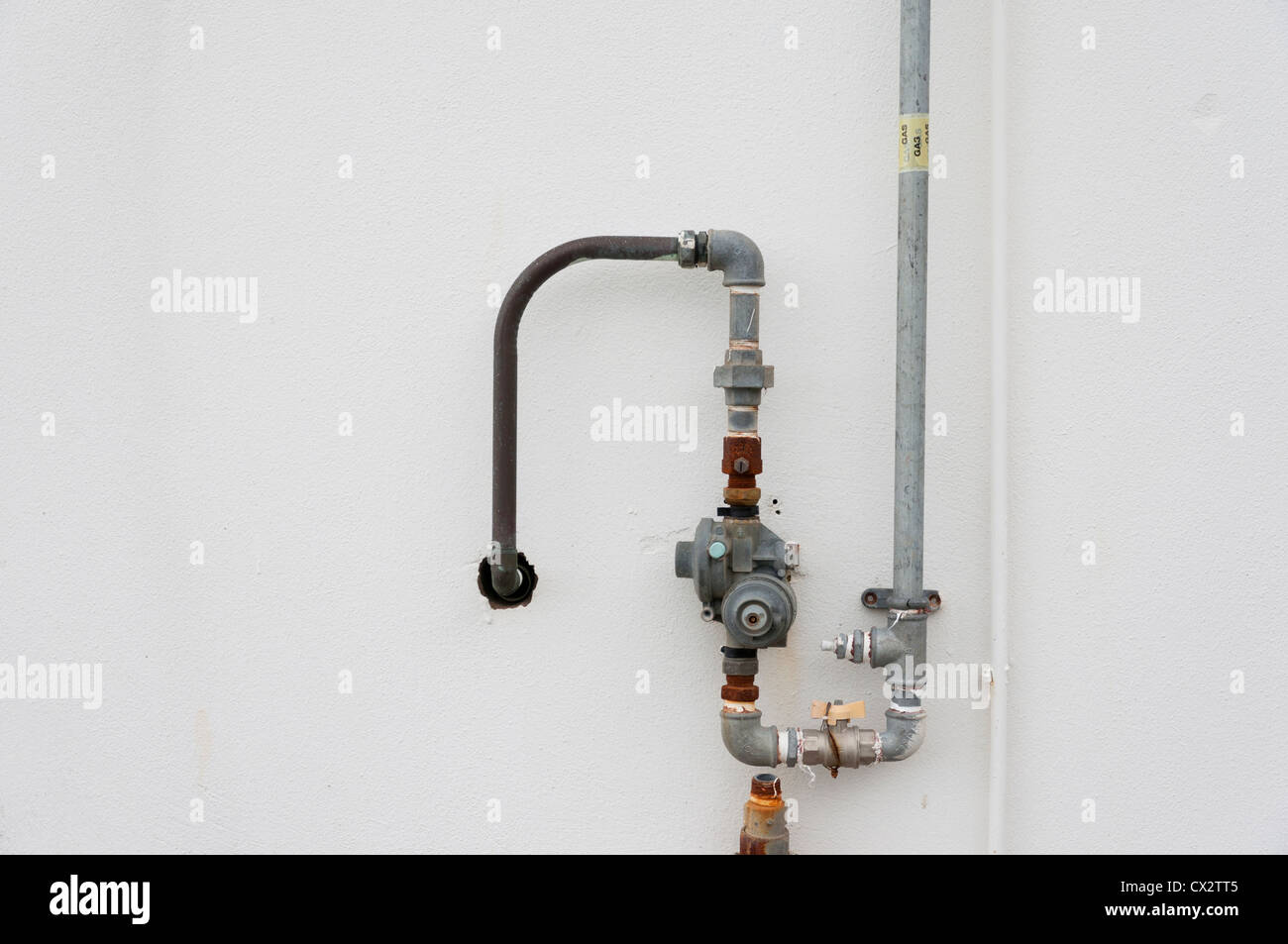 gas pipework on exterior wall of a building Stock Photo - Alamy