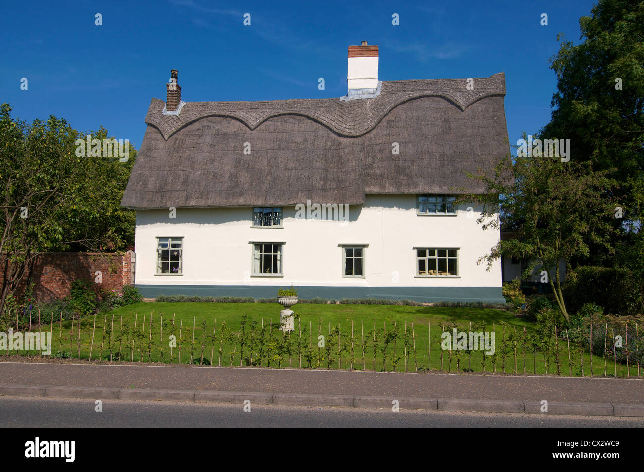 Thatched College in the Norfolk village of Pulham Market Stock Photo ...