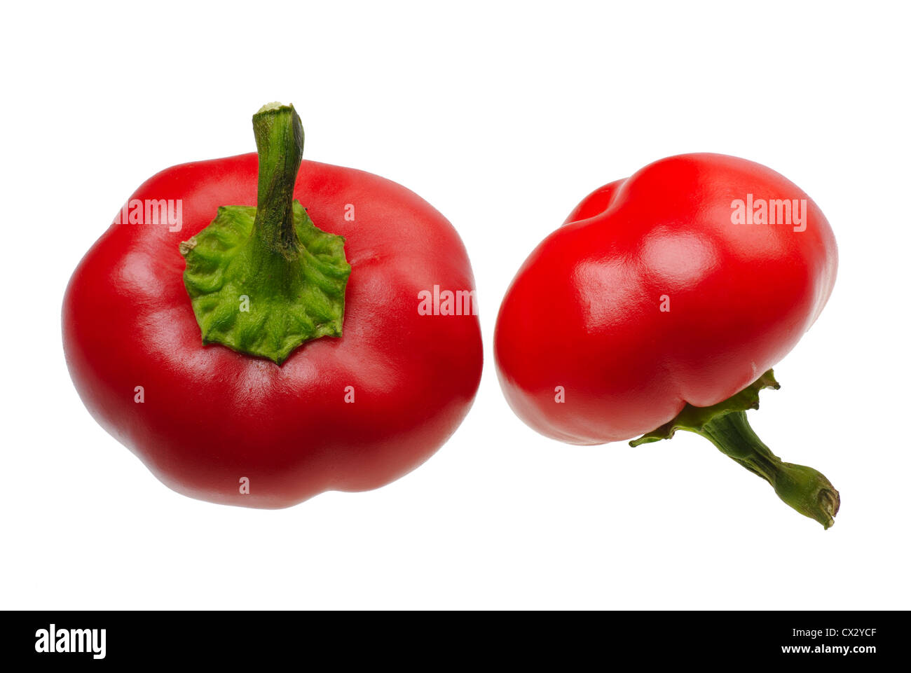 Two small round red peppers on a white background, isolated Stock Photo ...