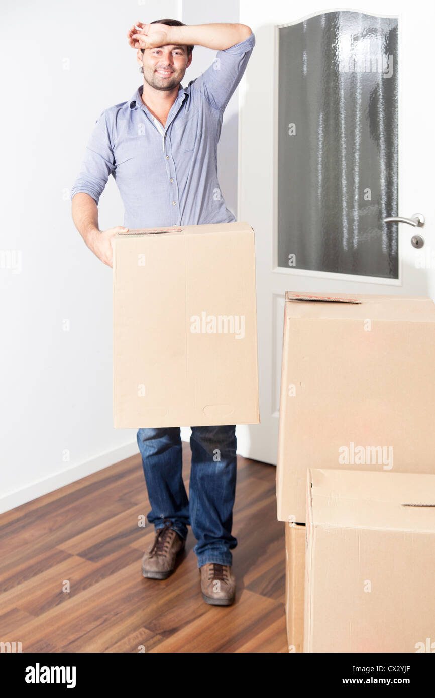 man tired of moving house Stock Photo - Alamy