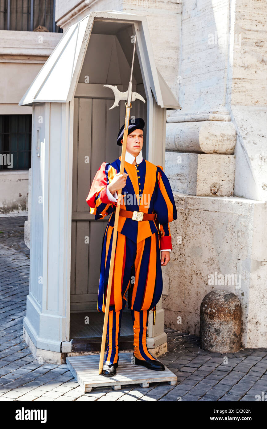 Swiss Guard on duty at a sentry box outside Saint Peter's Basilica ...