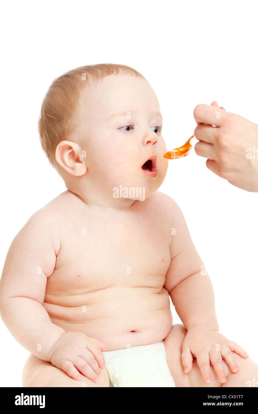 baby boy feeding isolated on white Stock Photo - Alamy