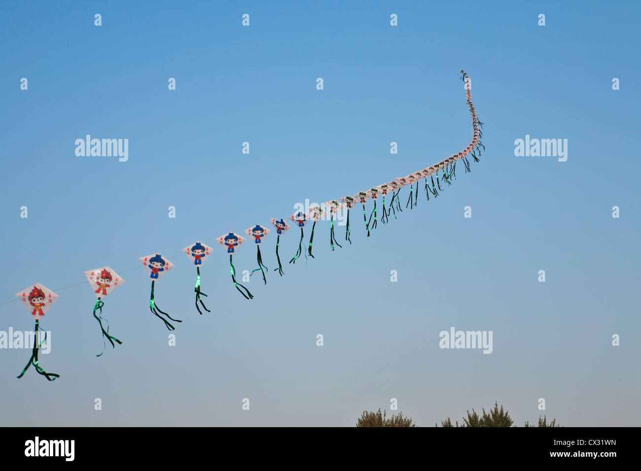 Flying kite string hi-res stock photography and images - Alamy