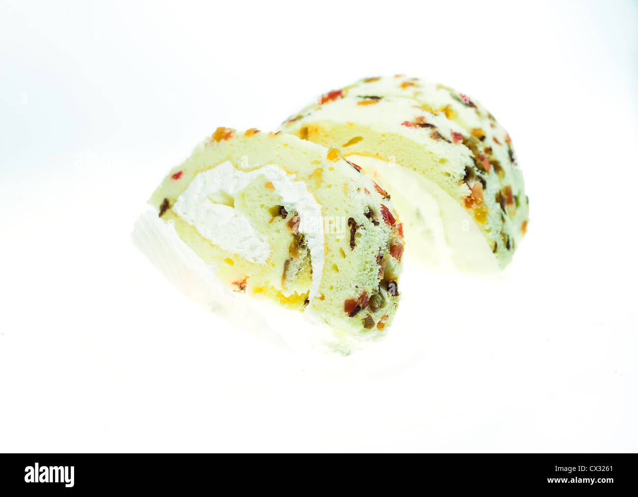 Fruit yam roll cake isolated on white background Stock Photo - Alamy
