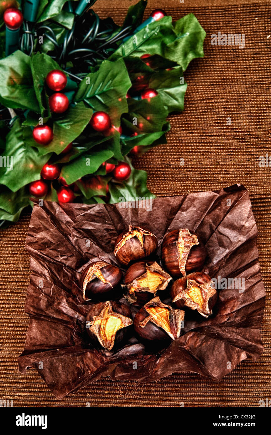 Roasted chestnut, in a studio background, Christmas related Stock Photo ...