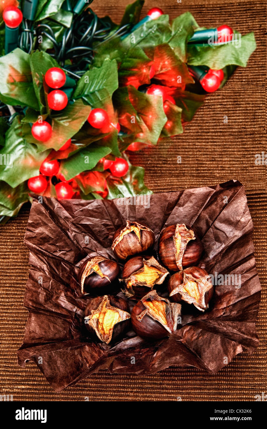 Roasted chestnut, in a studio background, Christmas related Stock Photo ...