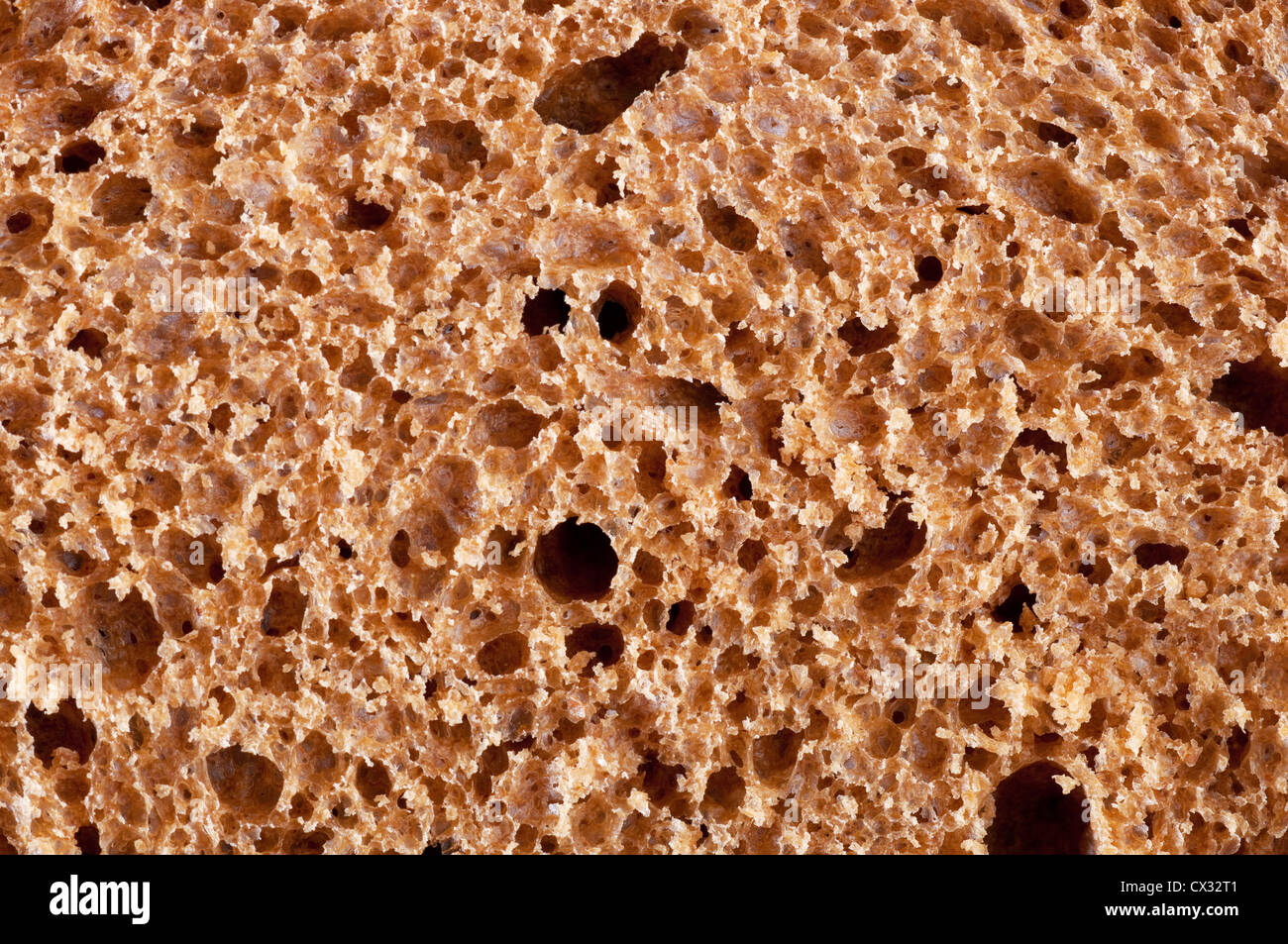 Texture of brown bread slice (close up Stock Photo - Alamy