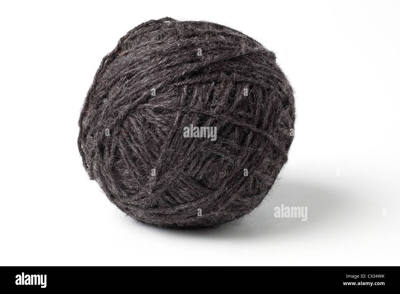 Clew of black thread isolated on white Stock Photo - Alamy