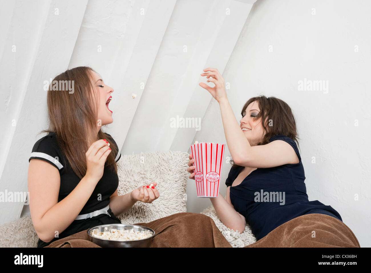 Eating popcorn uk hi-res stock photography and images - Alamy