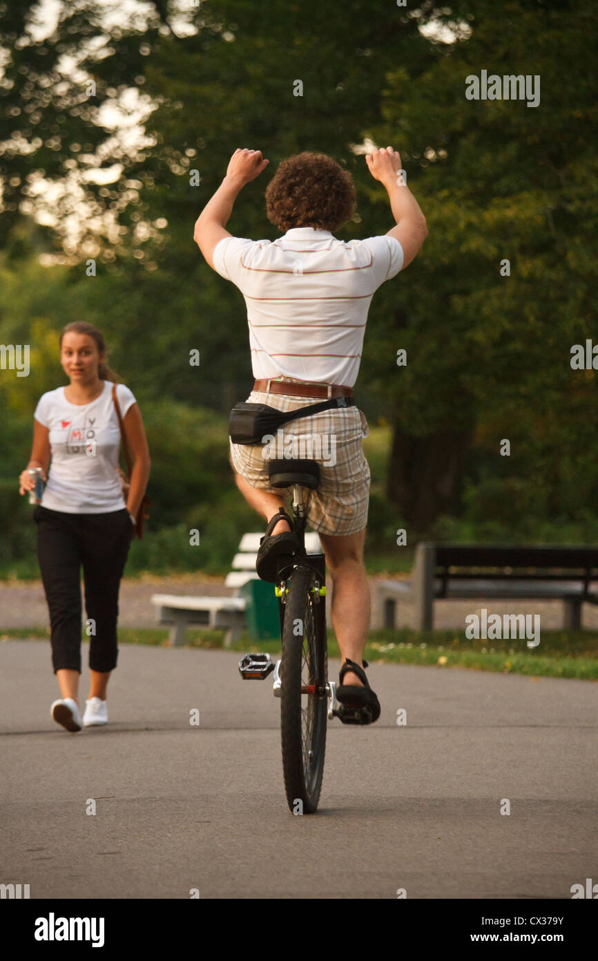 Man riding unicycle hi-res stock photography and images - Alamy
