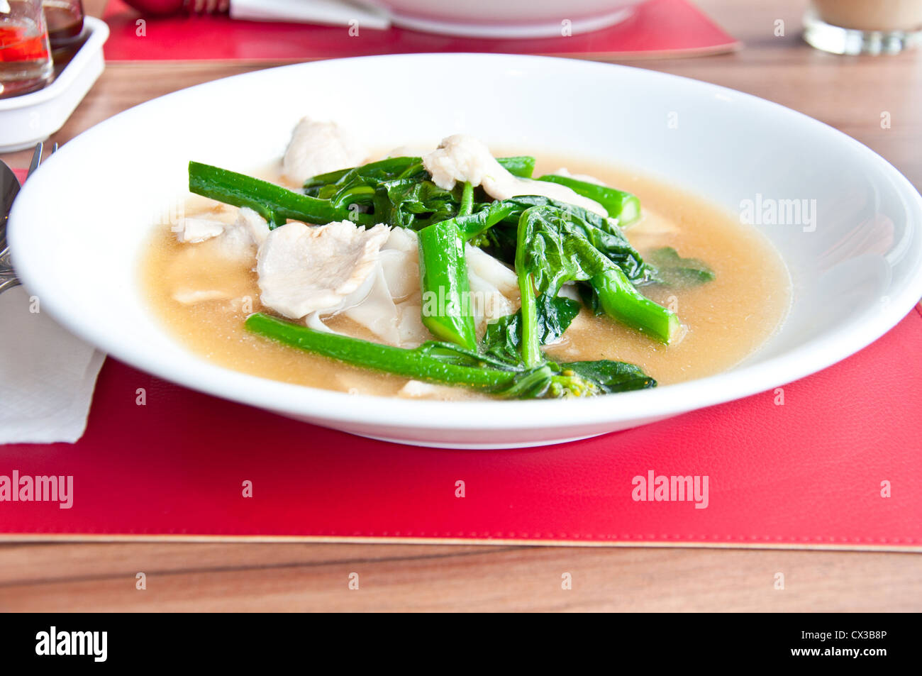 delicious Thai food call RADNA MOO from noodle and vegetable and soup ...