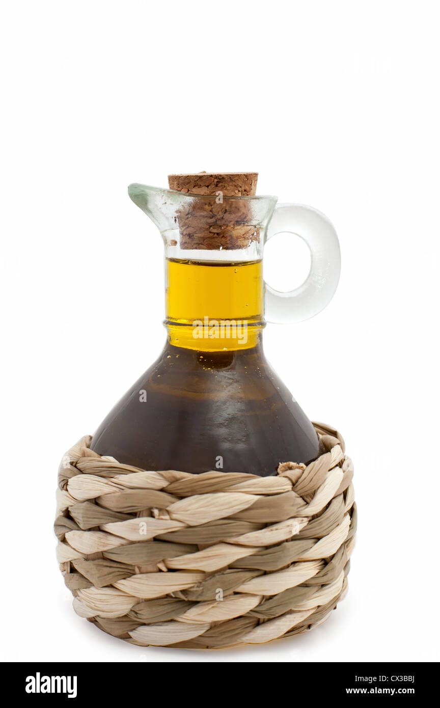 olive oil in a straw-rapped bottle Stock Photo - Alamy