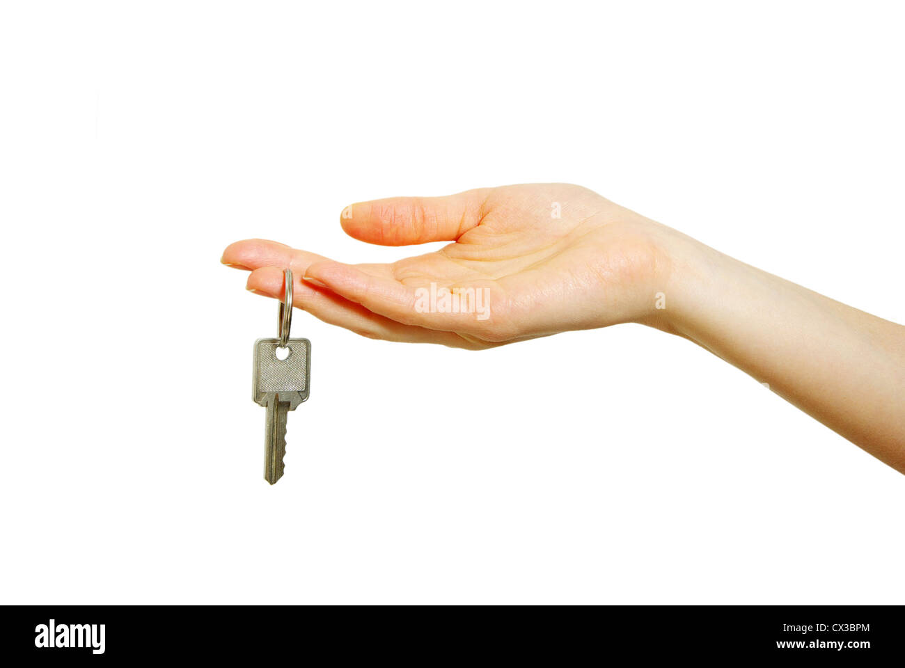 Hand holds key isolated Cut Out Stock Images & Pictures - Alamy