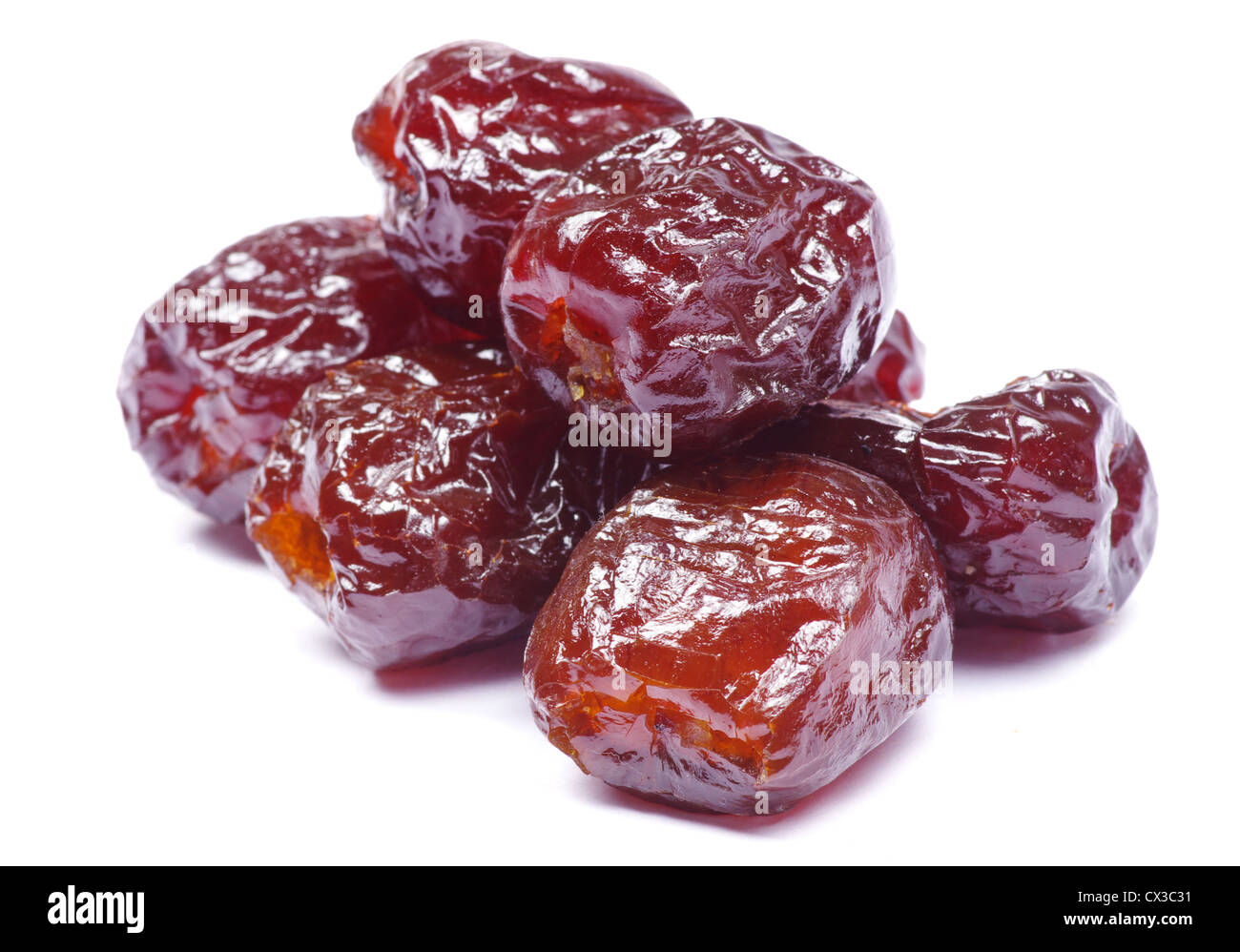 dryed dates on white background Stock Photo - Alamy