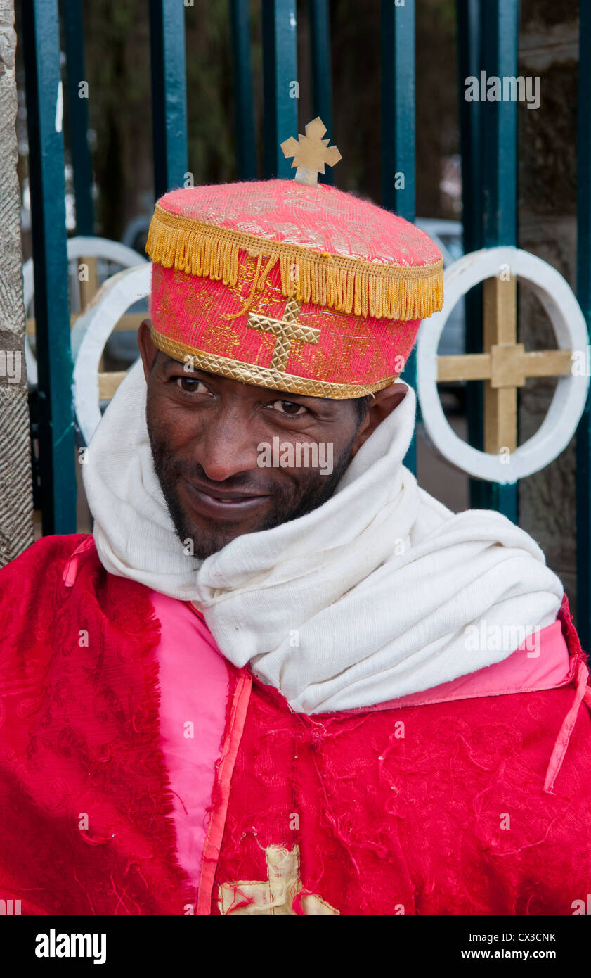 Addis Ababa Ethiopia Africa religious priest in red robe at Church of ...