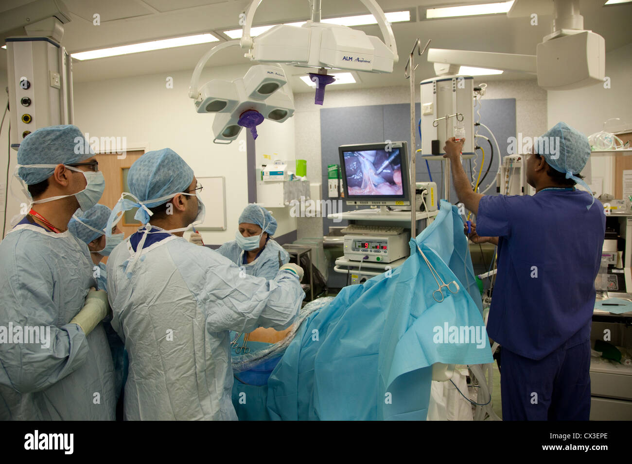 Surgeons monitor an operation Stock Photo - Alamy