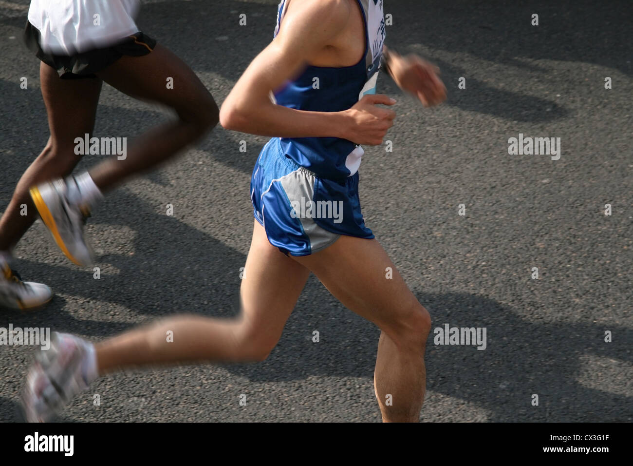 two athletes racing a marathon Stock Photo - Alamy