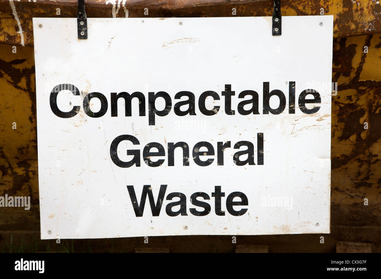 sign on skip at construction site Stock Photo - Alamy