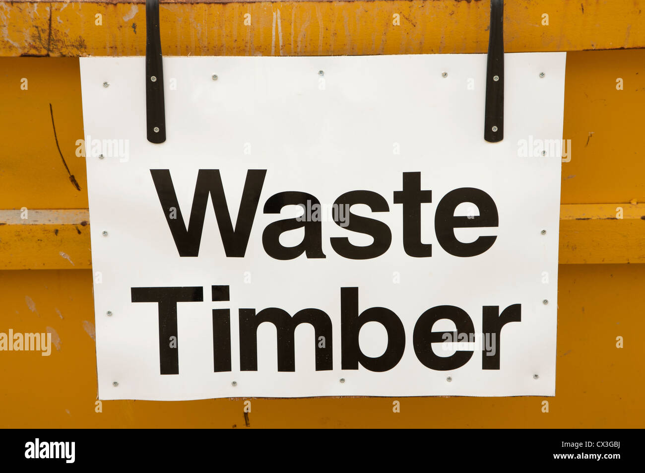 sign on skip at construction site Stock Photo - Alamy