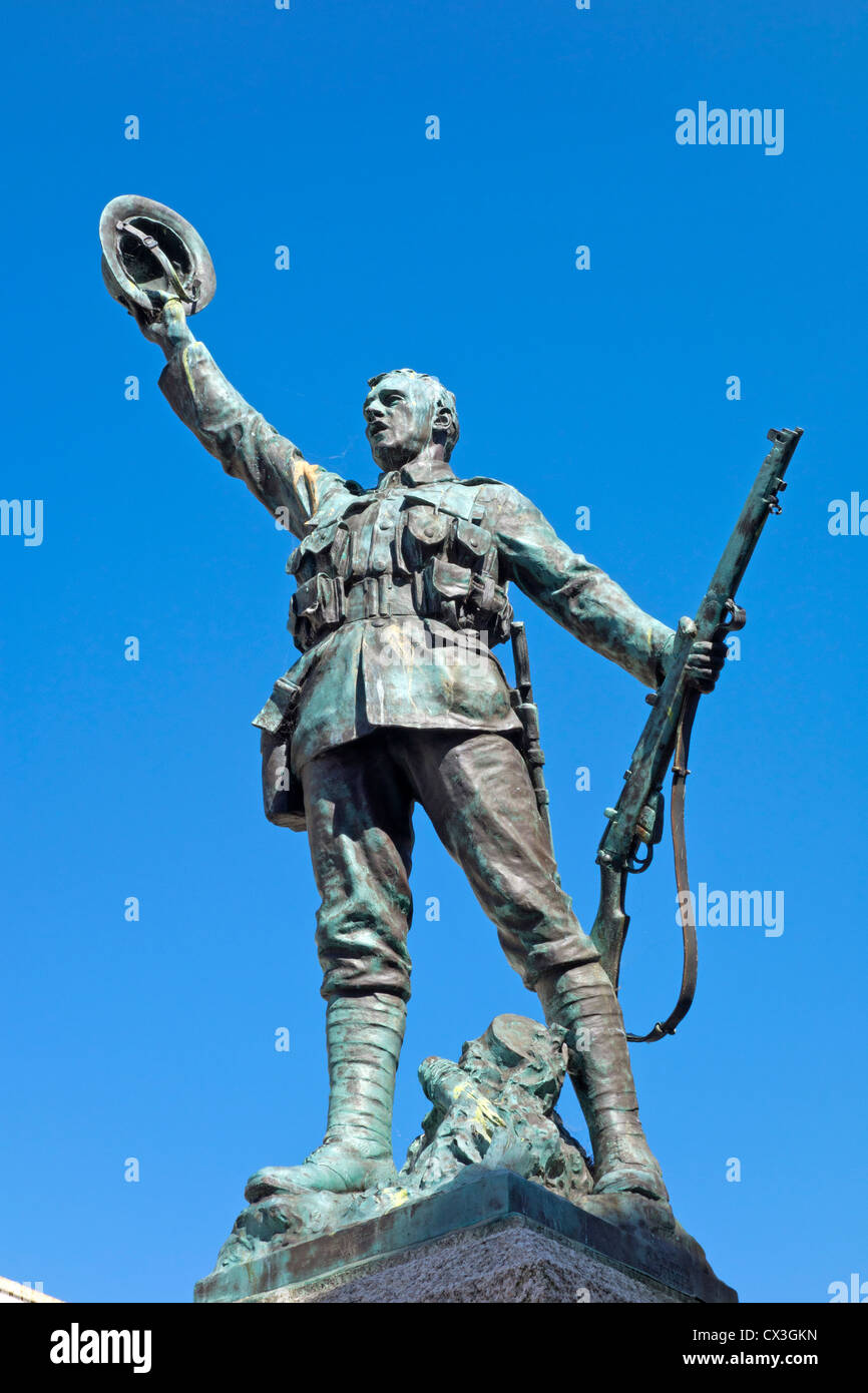 Truro War Memorial bronze statue of a foot soldier raising his helmet ...