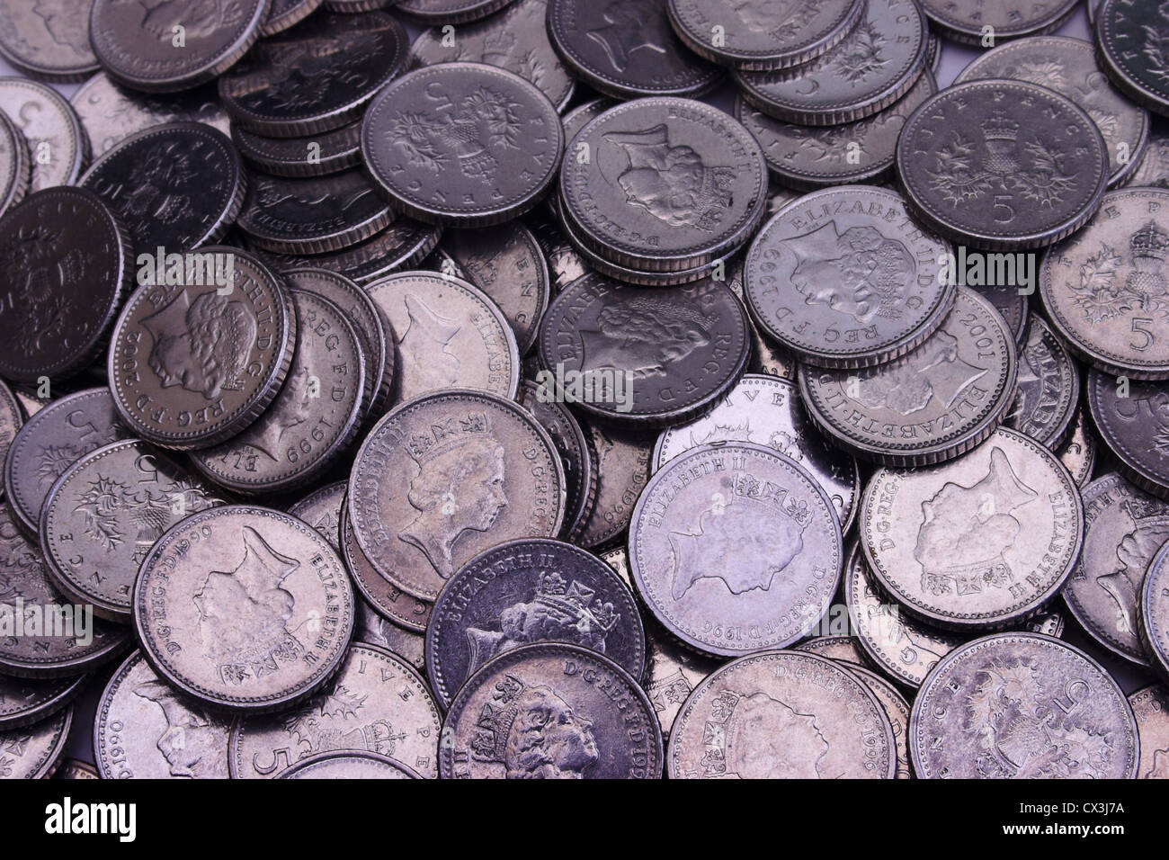 Macro image of a pile of 5p silver coins Stock Photo - Alamy