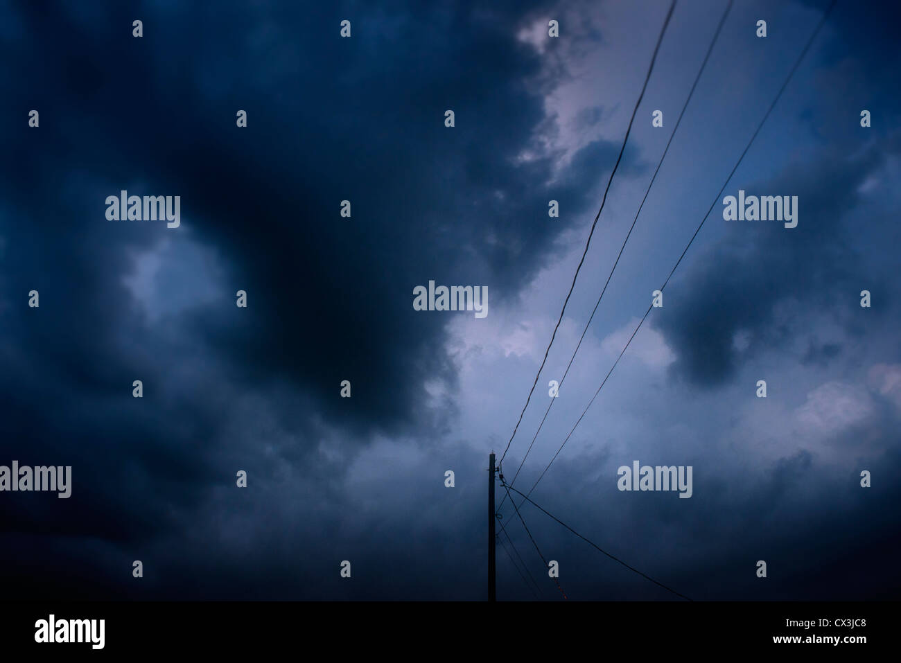 Pending storm and powerline Stock Photo - Alamy