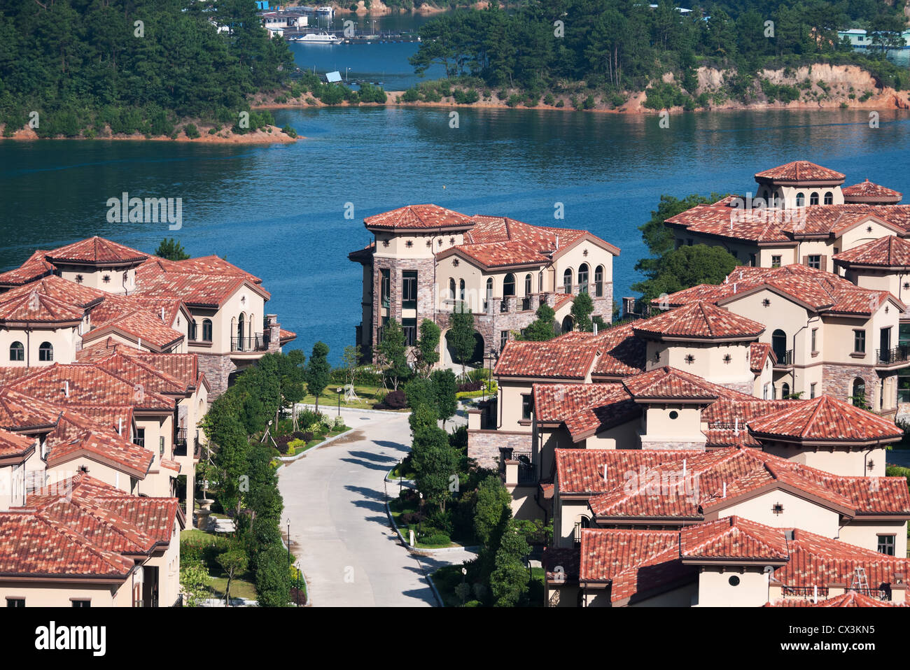Group of villas near the lake Stock Photo - Alamy