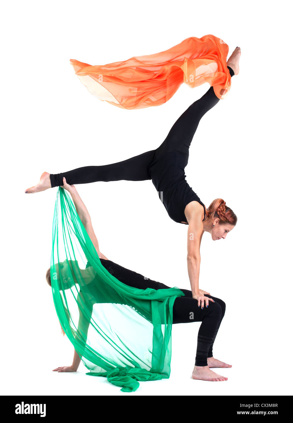 two woman gymnast stand with flying cloth isolated Stock Photo - Alamy