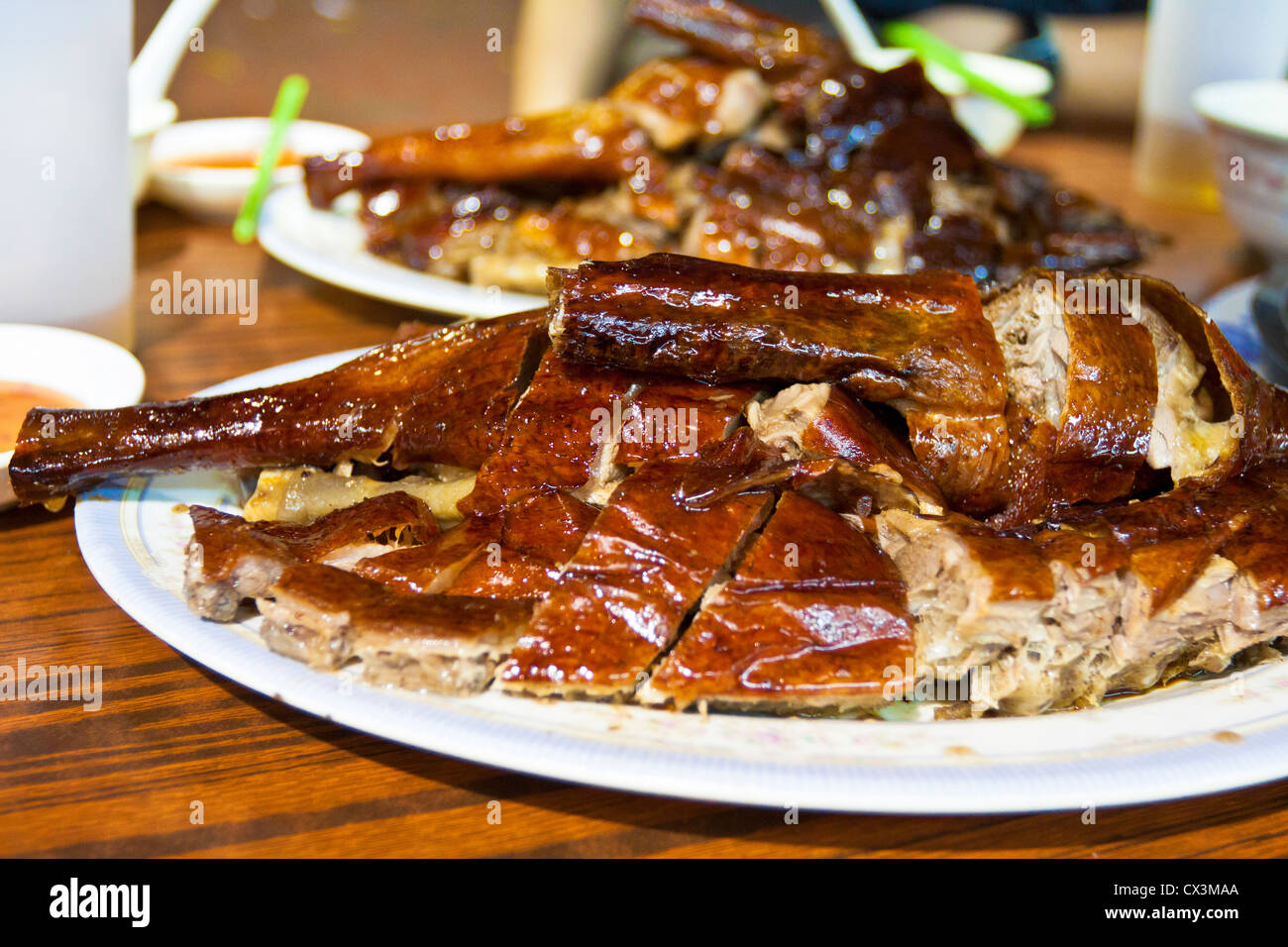 Roasted goose on table Stock Photo - Alamy