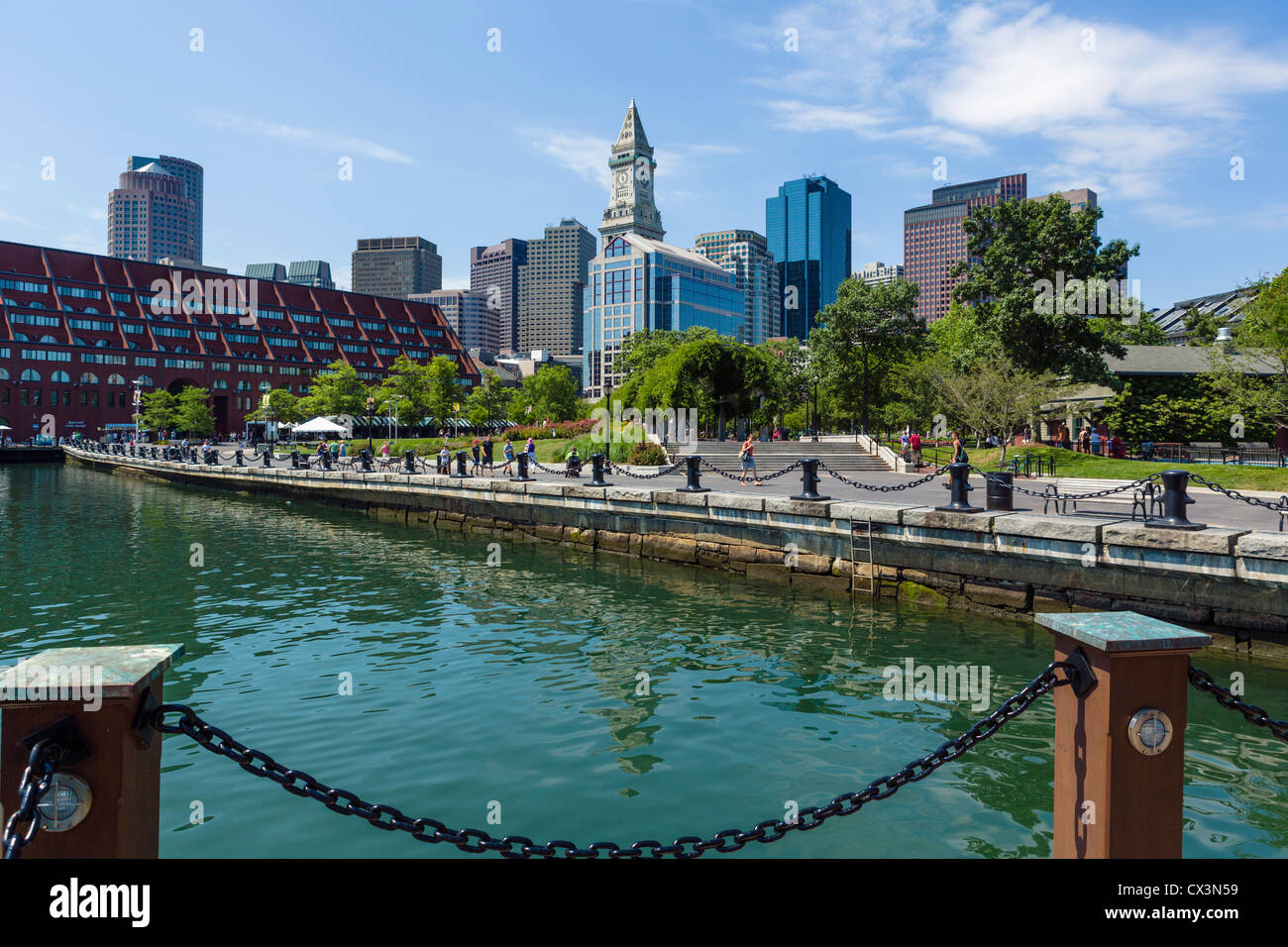City skyline from Boston Harbor at Christopher Columbus Waterfront Park ...