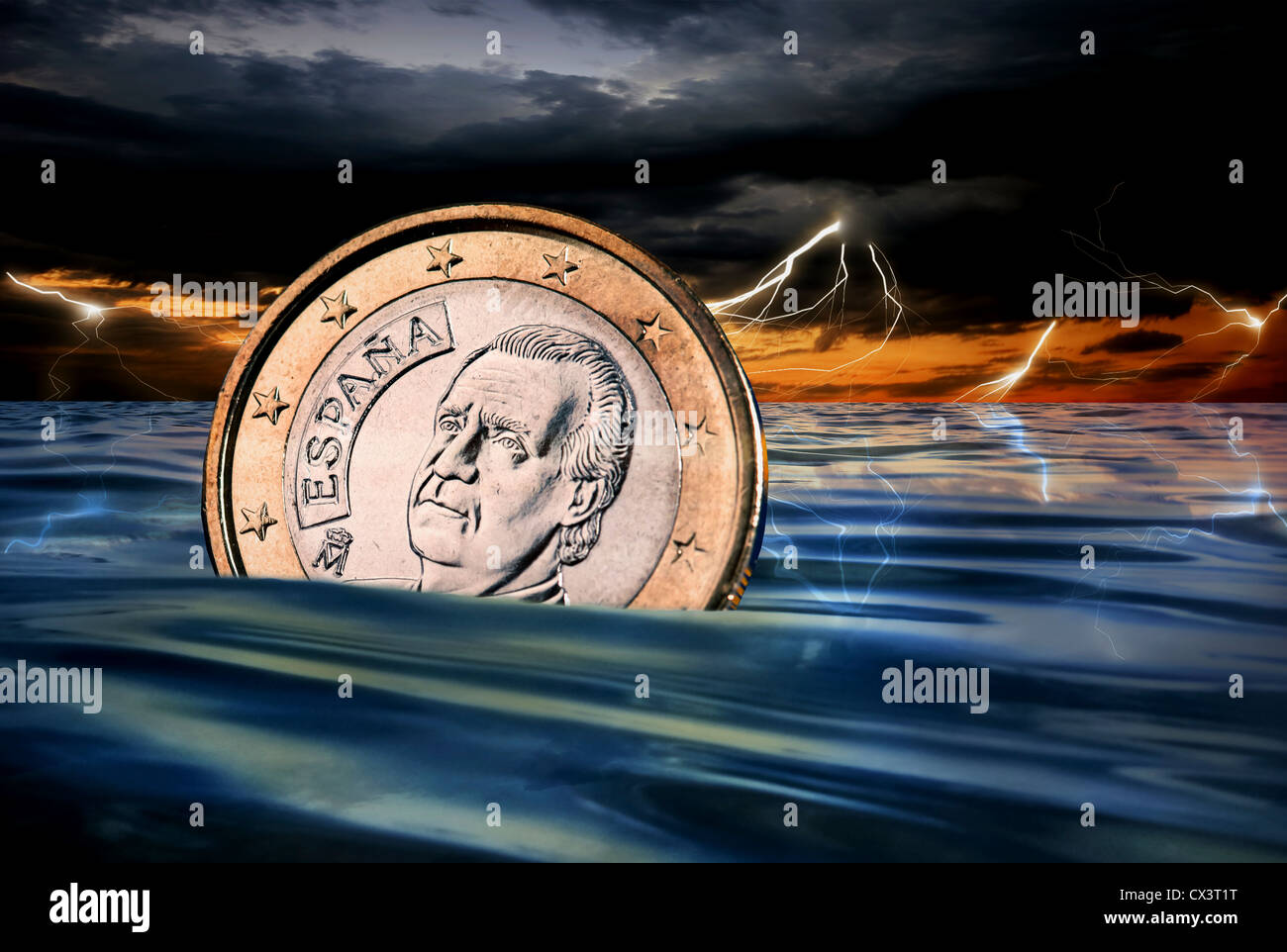 Spanish Euro coin drowning in the sea during a thunderstorm Stock Photo ...