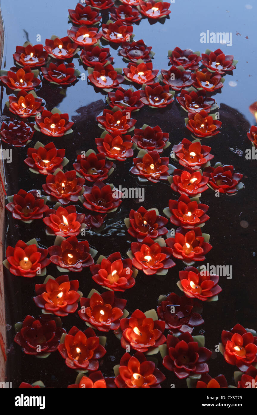 Lotus flower and candles hi-res stock photography and images - Alamy