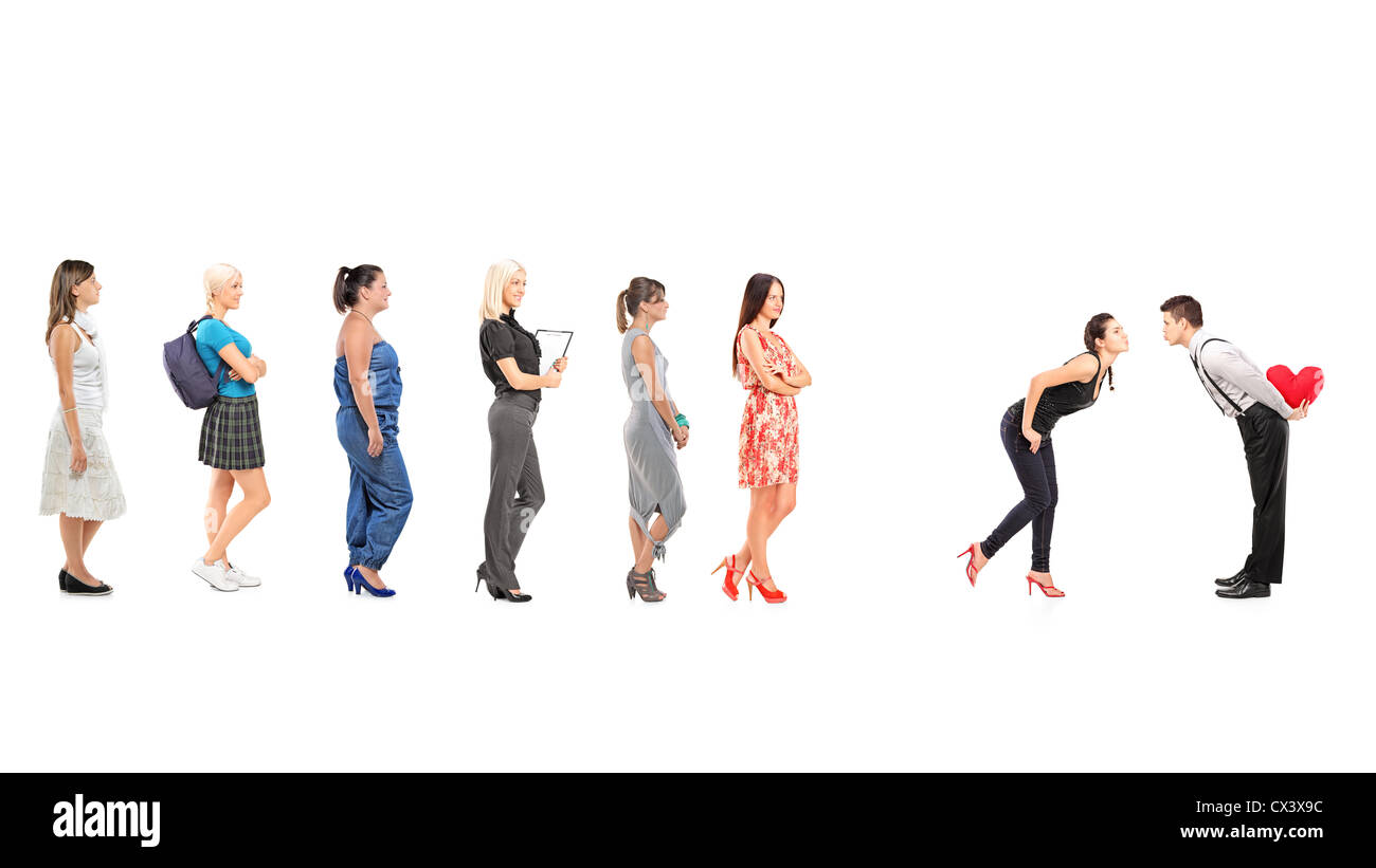 Females waiting in line to kiss a guy isolated on white background ...