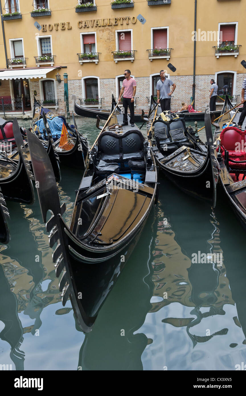 Gondoliers waiting for tourists, Venice, Italy Stock Photo - Alamy