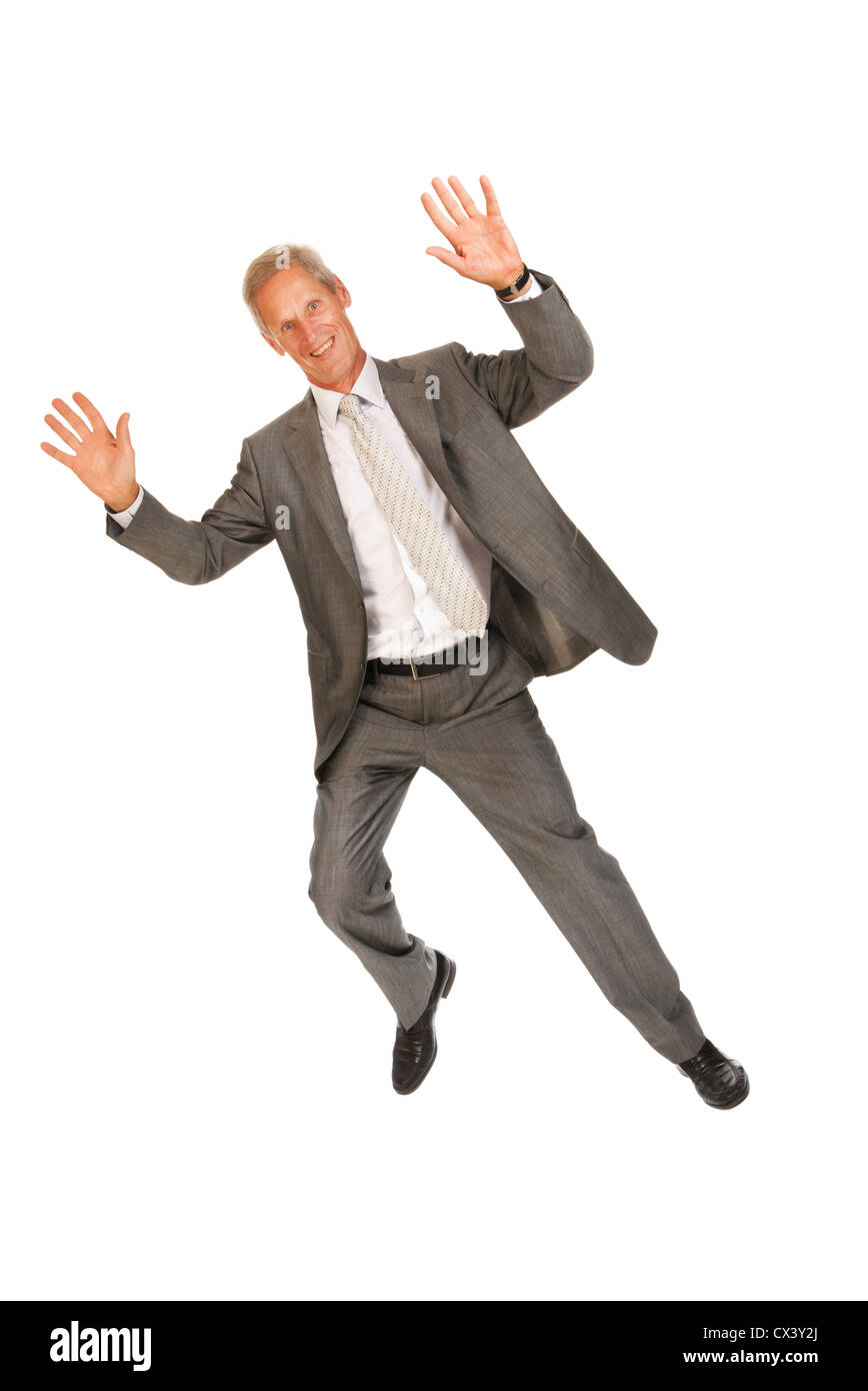 Jumping business man isolated over white background Stock Photo - Alamy
