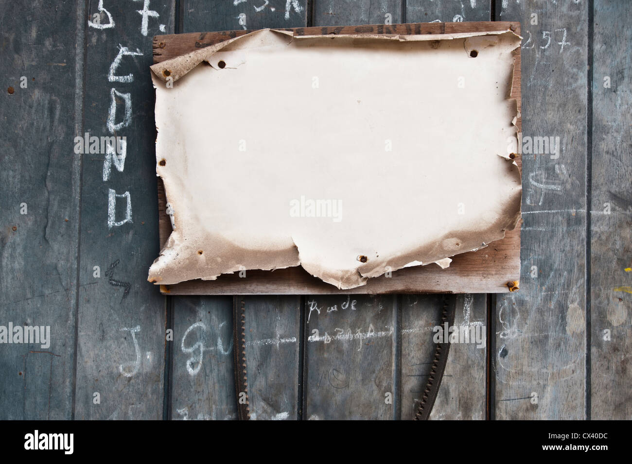 Sheet of paper on a wooden fence Stock Photo - Alamy